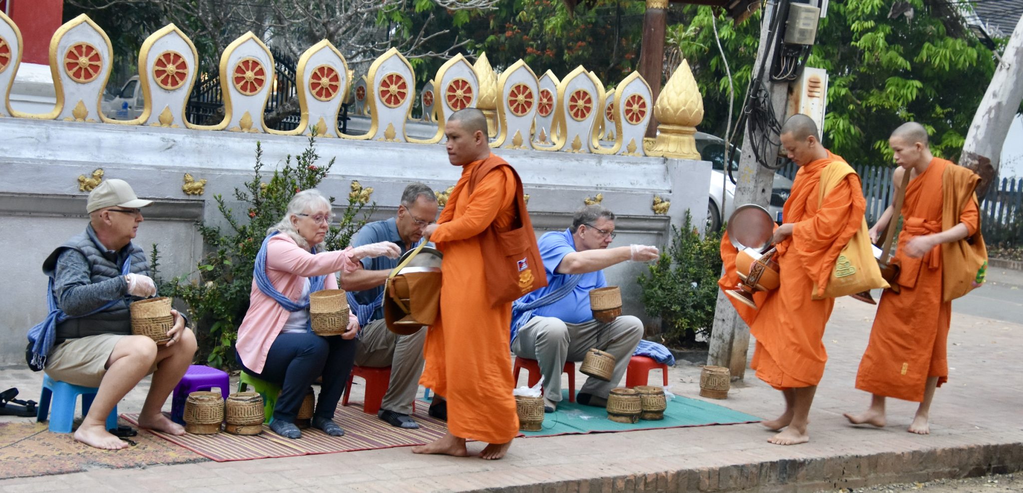 Alms Giving in Luang Prabang - The Maritime Explorer